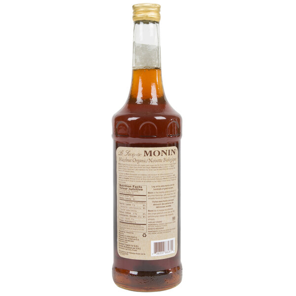 Monin 750 mL Organic Hazelnut Flavoring Syrup