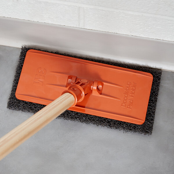 3M 8550 Doodlebug 10" x 4 5/8" Hi Pro Black Stripping Pad - 10/Pack