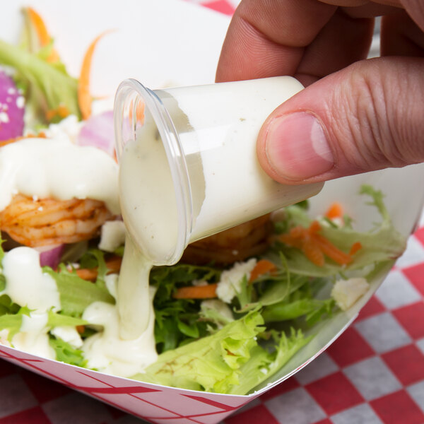 Choice 1.25 oz. Clear Plastic Souffle Cup / Portion Cup - 100/Pack