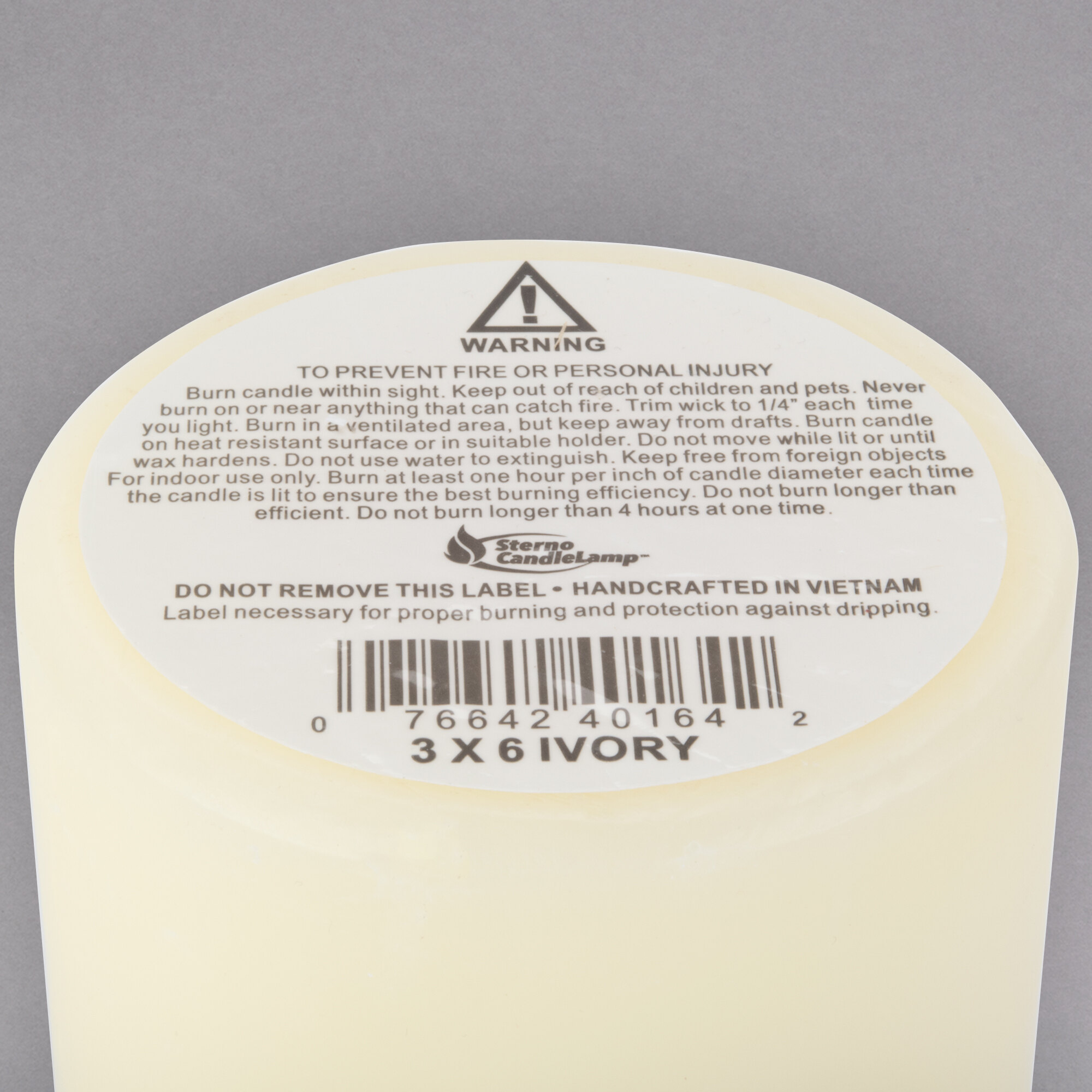 Sterno 40164 6 1/2" Ivory Wax Pillar Candle - 12/Case
