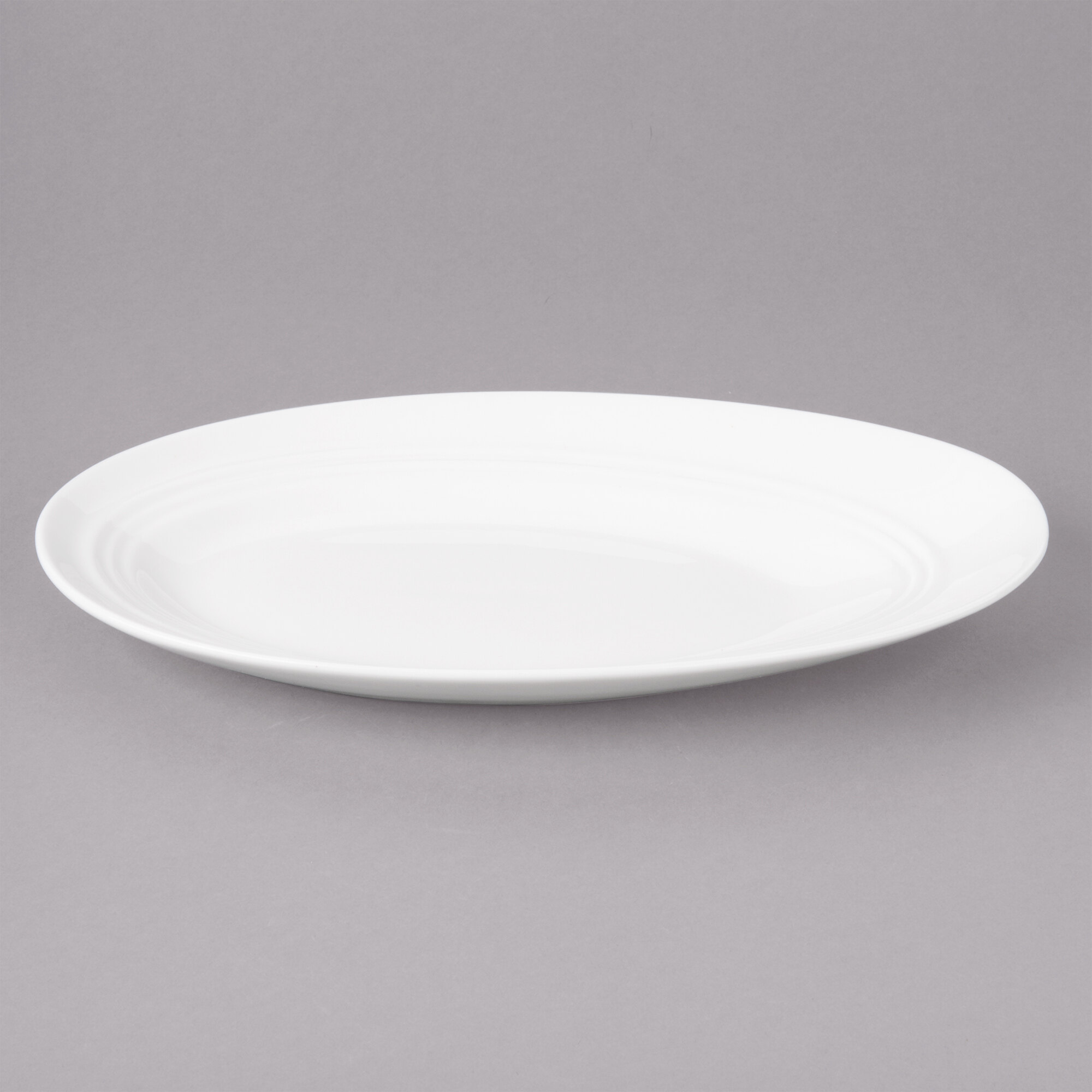 Bon Chef 1100008P Slanted Oval 11" x 6 1/2" White Porcelain Plate - 24/Case