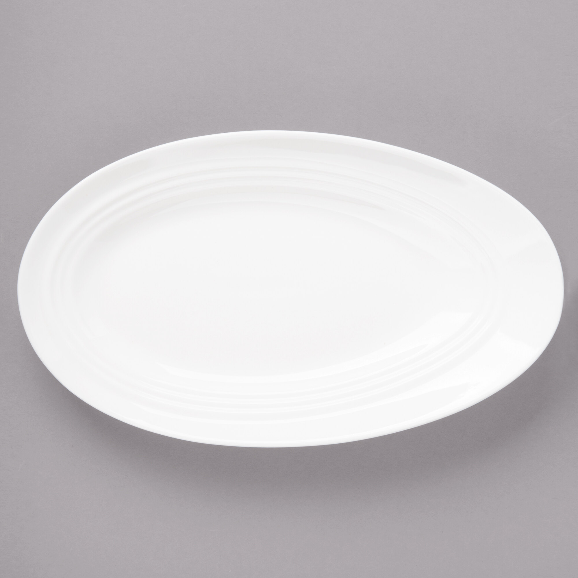 Bon Chef 1100008P Slanted Oval 11" x 6 1/2" White Porcelain Plate - 24/Case