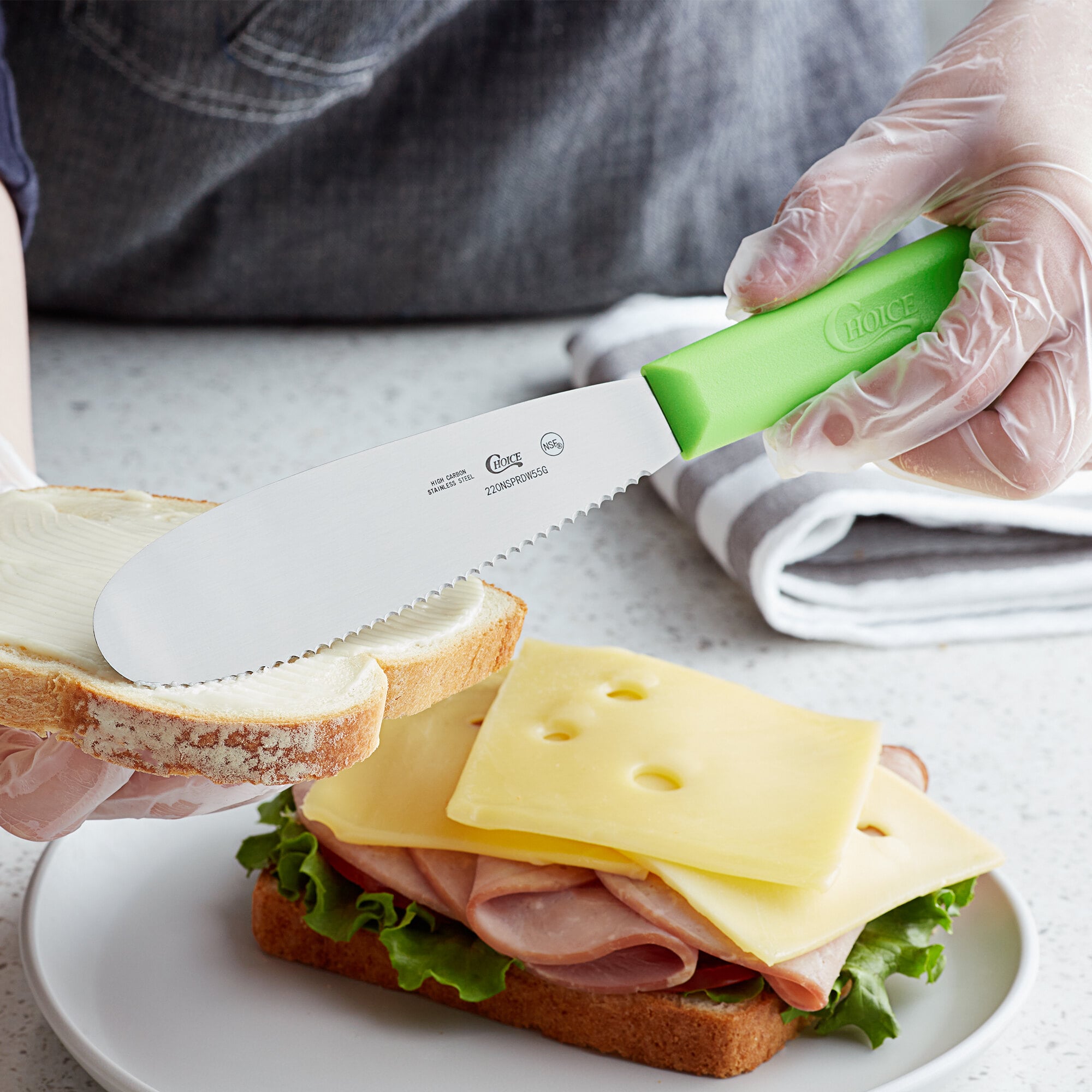 Choice 5 1/2" Scalloped Stainless Steel Sandwich Spreader with Neon ...
