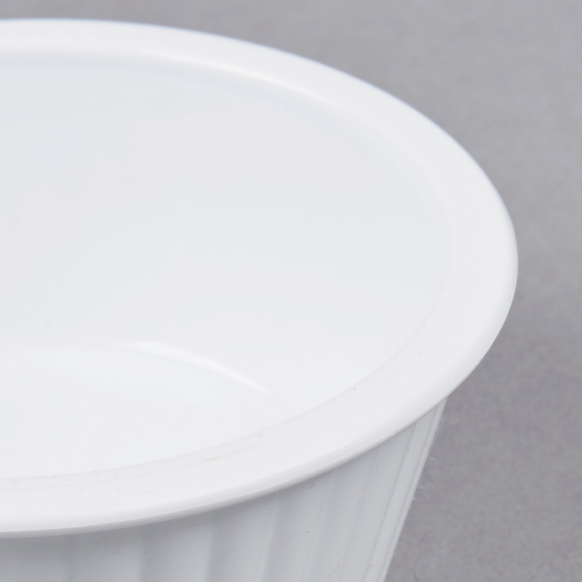 Carlisle 084402 White 2 oz. Fluted Plastic Ramekin - 48/Case